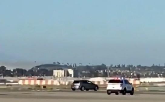 Police chase LAX intruder's car across two busy runways after major ...