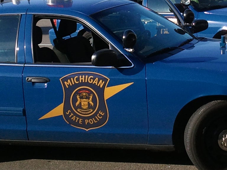 Michigan State Police trooper finds woman shot in the foot during ...