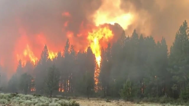 Largest wildfire in U.S. spreads, larger than size of New York City and ...