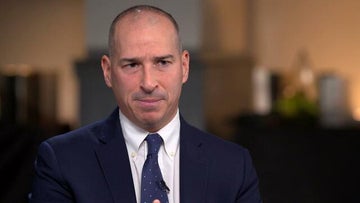 Man who took Pelosi's podium during Capitol riot sentenced to prison ...