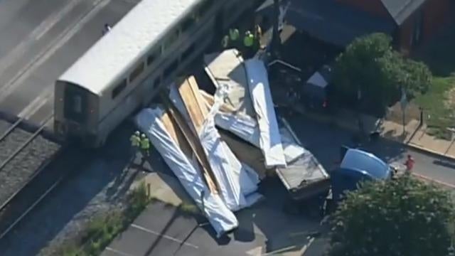 Amtrak train hits tractor trailer in Maryland; 1 injured, fire ...