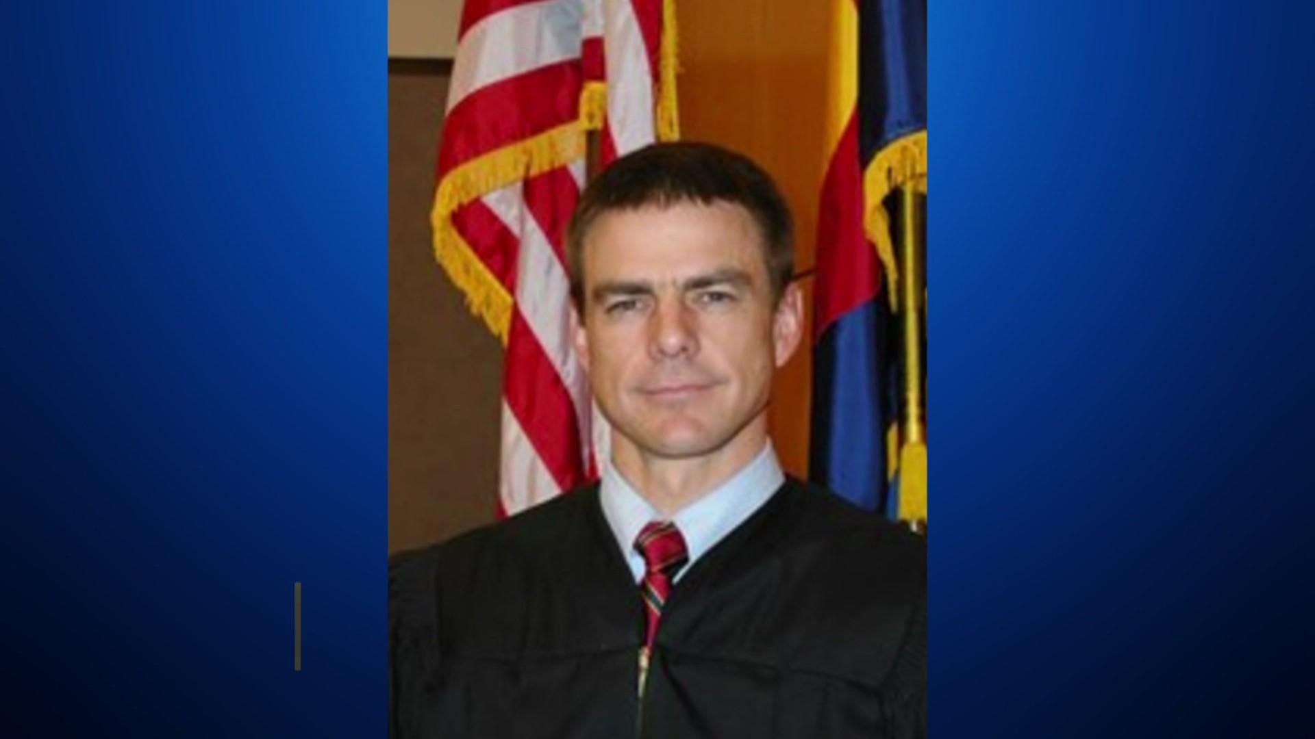 Judge who pointed AR-15 style rifle at stepson suspended - CBS Colorado