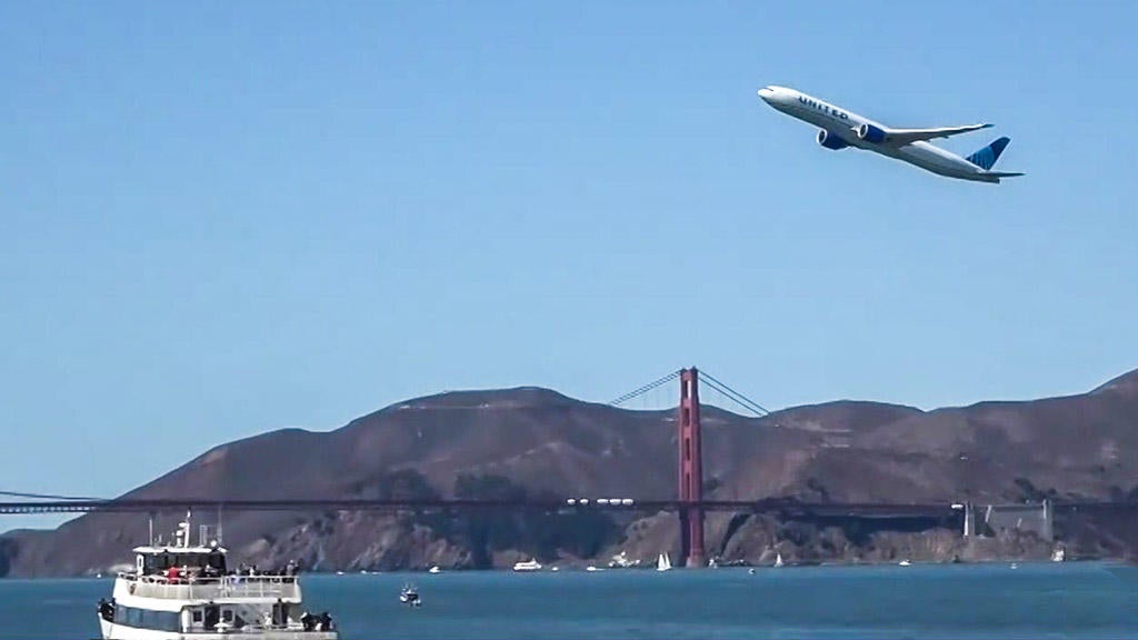 Boeing 777 flies low over Golden Gate Bridge for Fleet Week - CBS San ...
