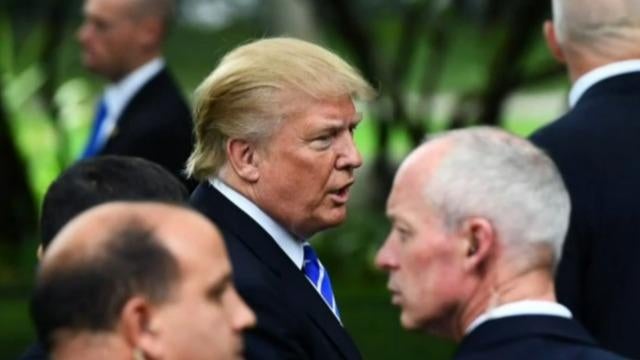 Trump employee seen moving boxes on Mar-a-Lago security footage ...