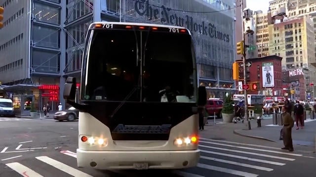 Migrants bused from southern border to New York City enter a backlogged ...