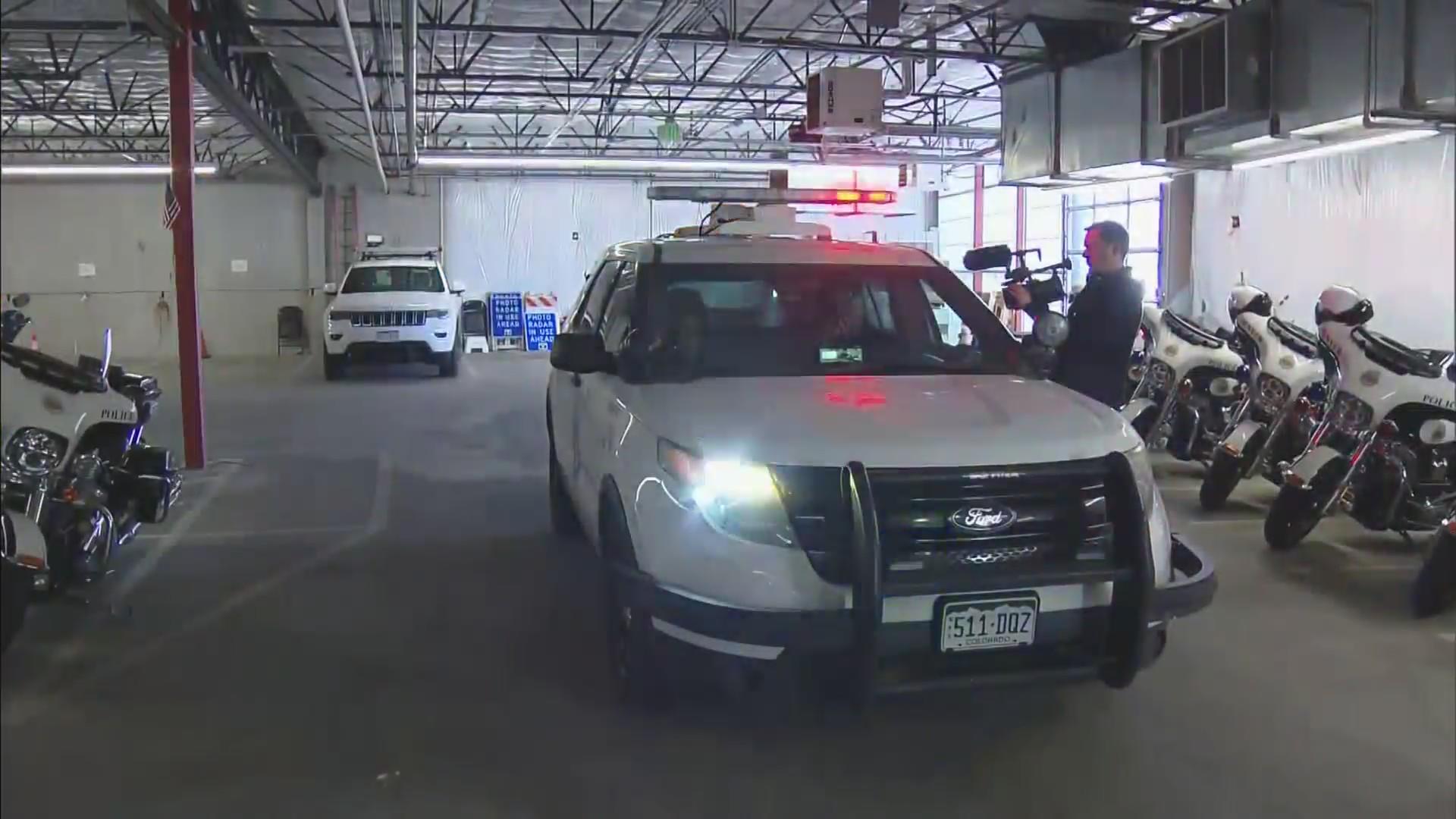 Denver police officers meet with students to discuss traffic safety ...