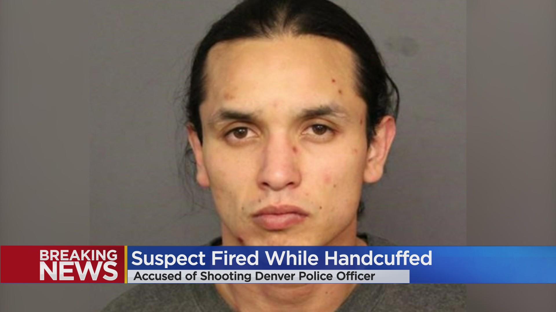 Police say handcuffed suspect who shot Denver officer is 33-year-old ...