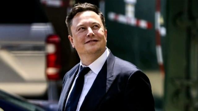 Elon Musk says he sleeps on a couch at Twitter headquarters and his dog ...