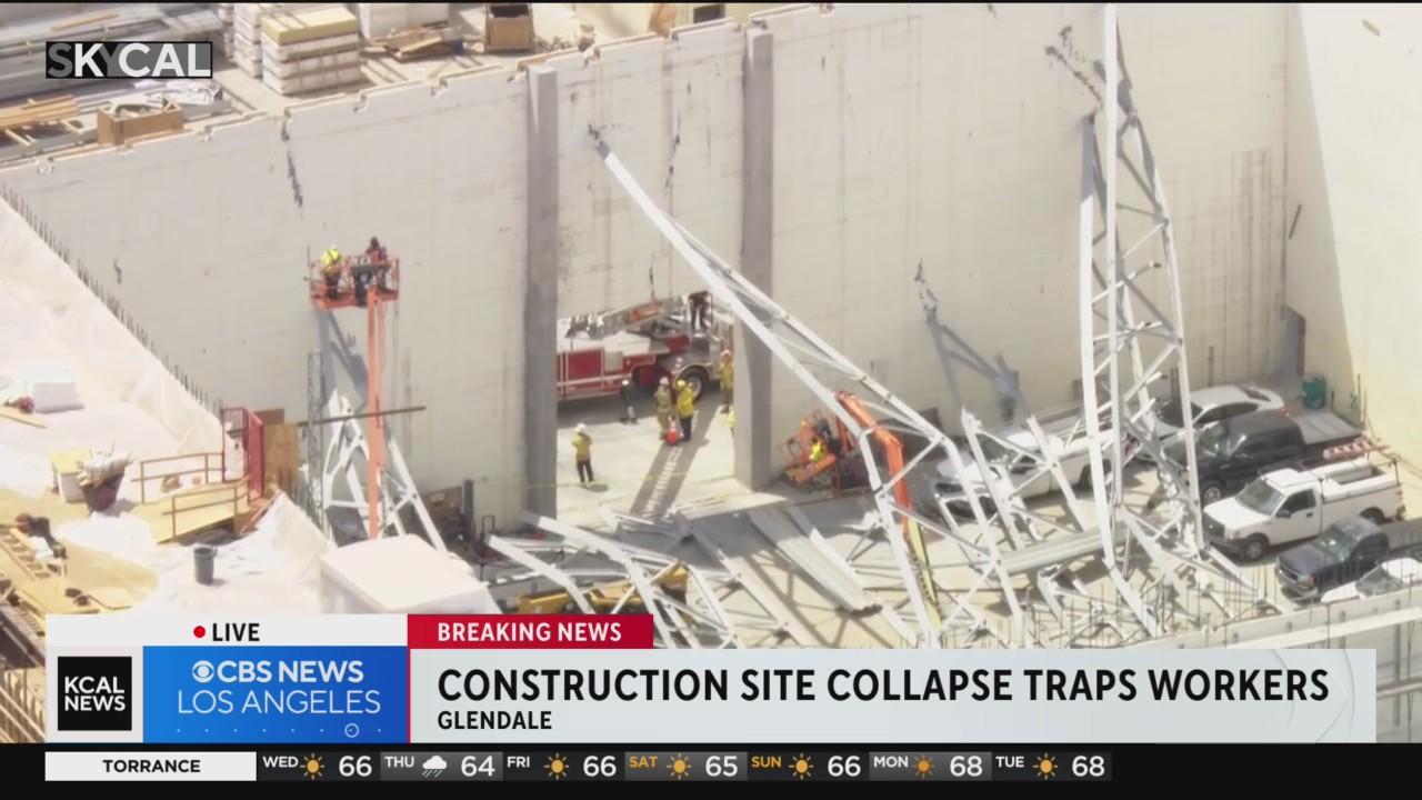 Firefighters rescue construction workers after structure collapses in ...