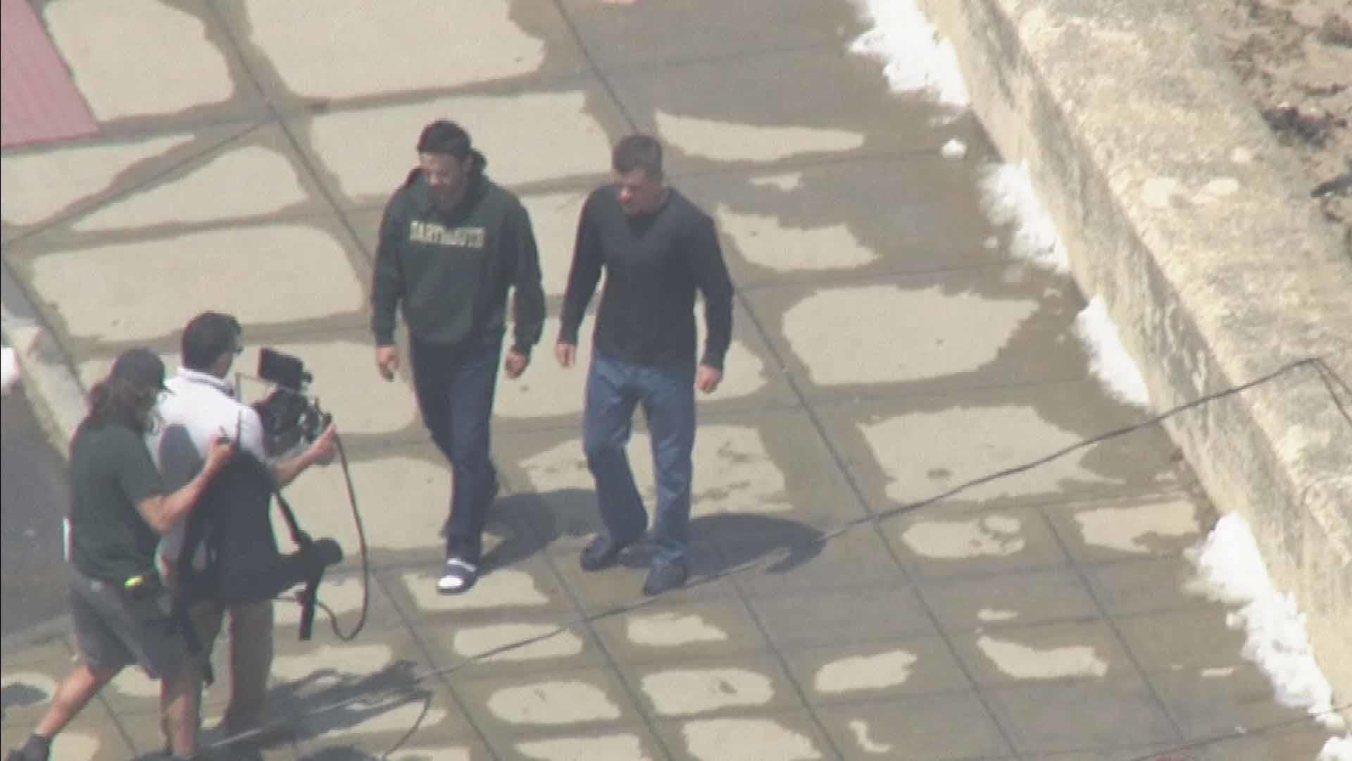 Matt Damon, dressed as a firefighter, meets the mayor at Boston City ...