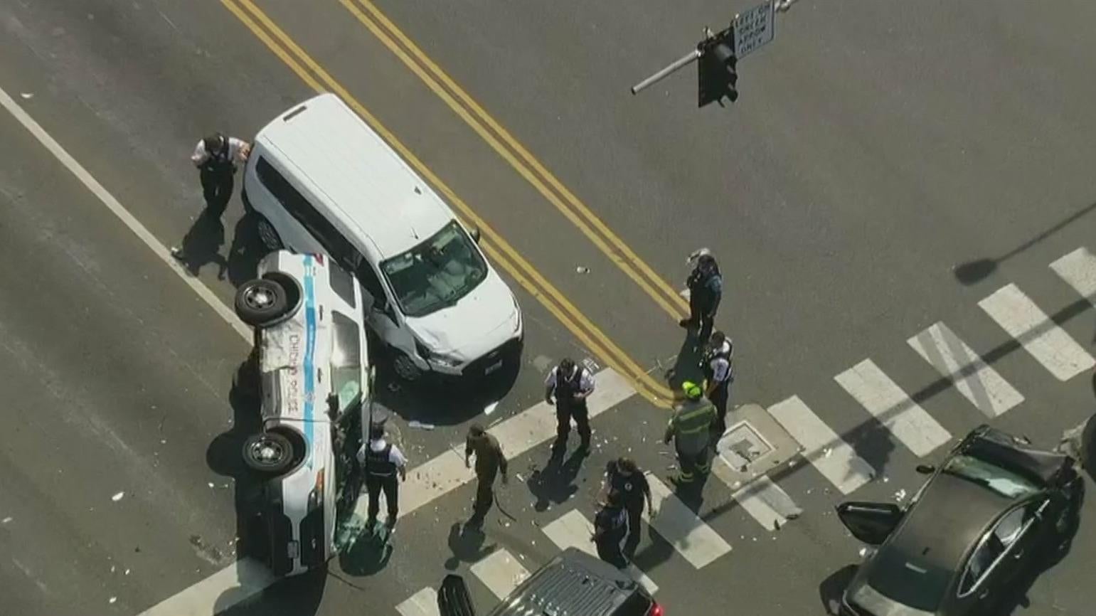 CPD car flips on its side after crash in Oak Park - CBS Chicago