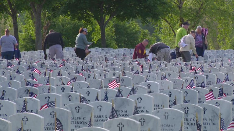 Volunteers prep Fort Snelling National Cemetery for Memorial Day ...