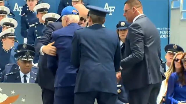 Biden falls onstage after tripping at Air Force Academy commencement ...