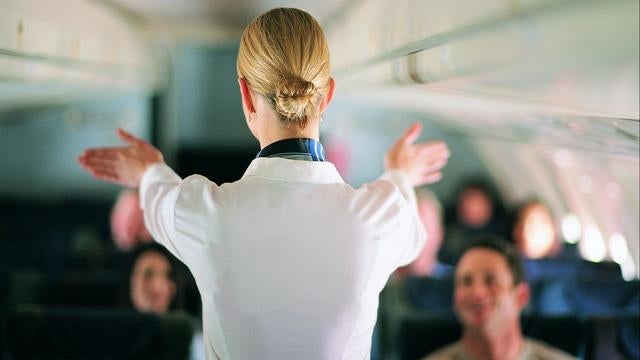 How to behave on an airplane during the "beast" of summer travel - CBS News