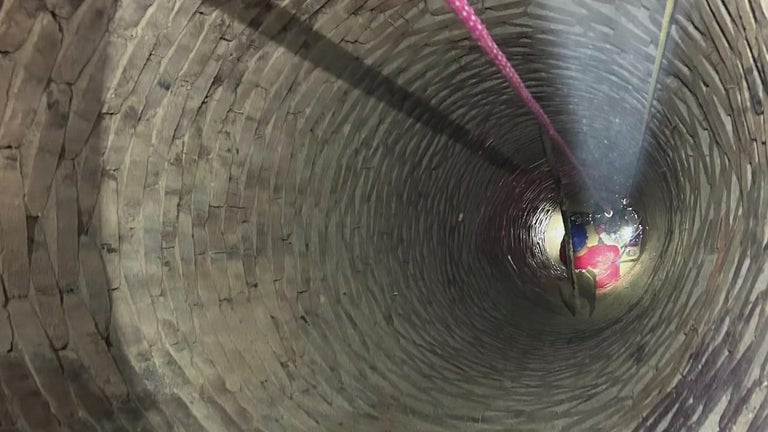 Contractor rescued after falling down well in Orland Park - CBS Chicago