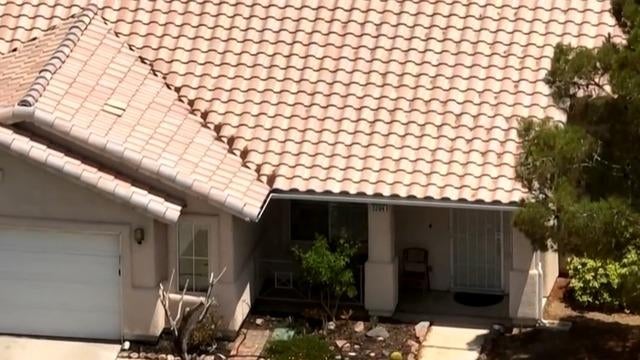 Las Vegas police search home in connection to Tupac Shakur murder - CBS News