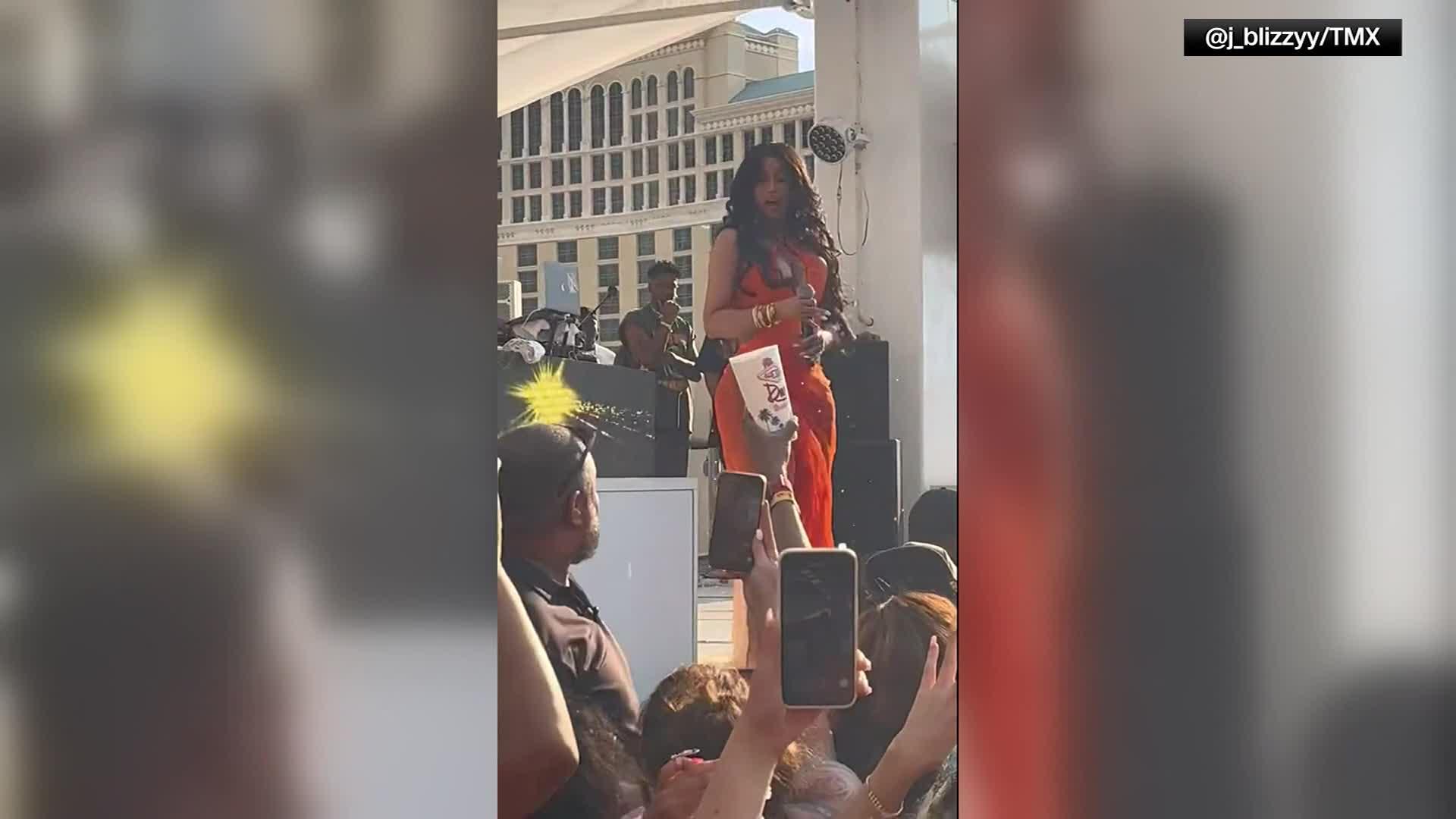 Fan files police report after Cardi B throws microphone off stage ...