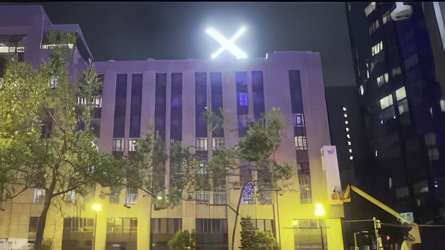 Flashing "X" installed on top of Twitter headquarters in San Francisco ...