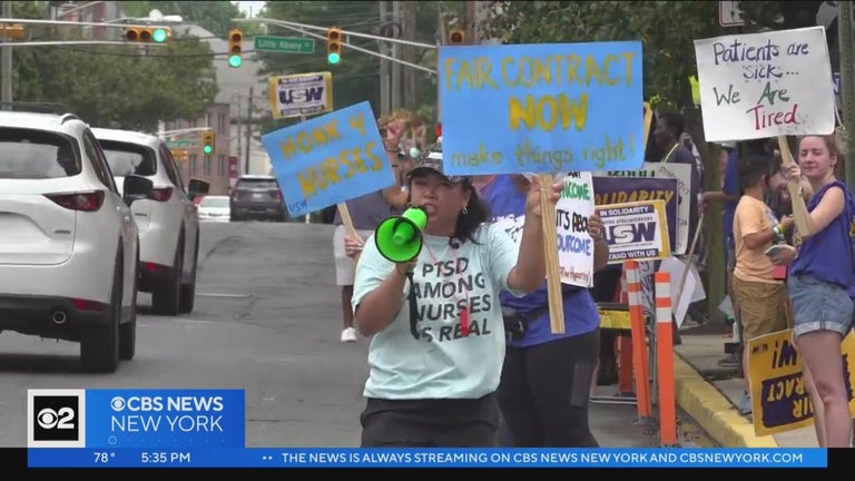 Nurses on strike picket outside Robert Wood Johnson University Hospital ...