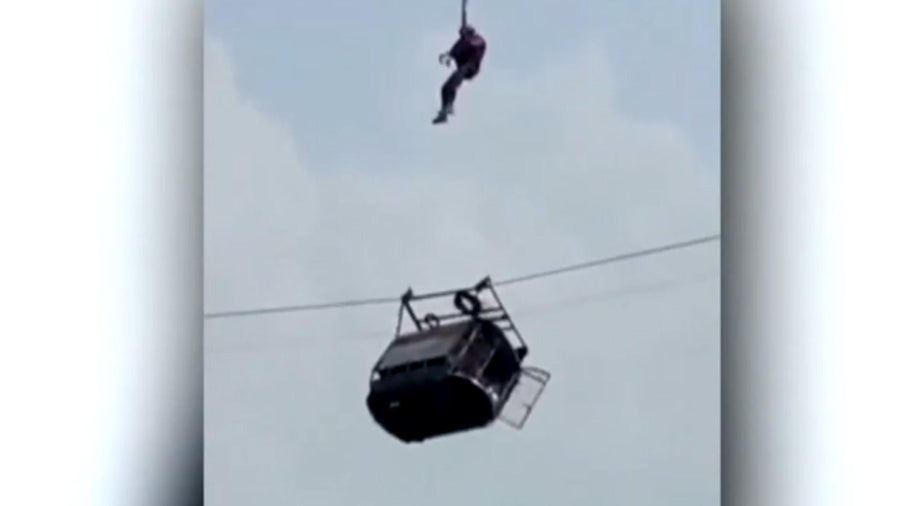 All 8 people rescued from cable car dangling hundreds of feet above canyon in Pakistan ...
