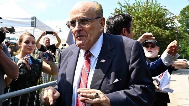 See Rudy Giuliani's mug shot after the embattled Trump ally turned ...