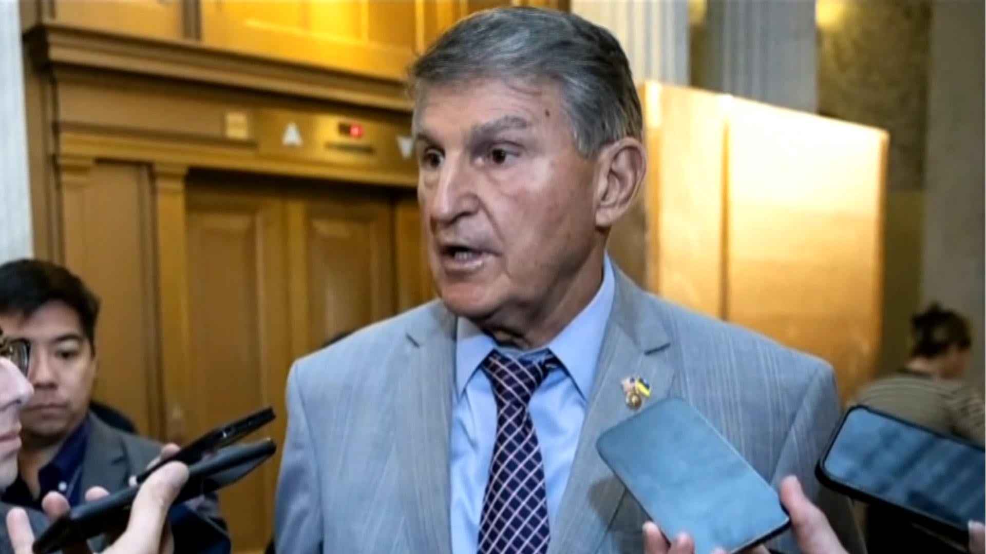 Joe Manchin says he won't run for reelection to Senate in 2024 - CBS News
