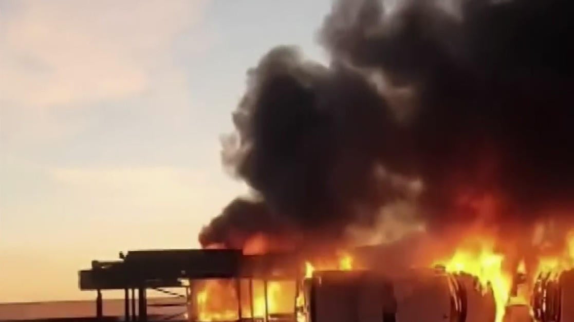 Car carrier bursts into flames, causing standstill on I-294 - CBS Chicago