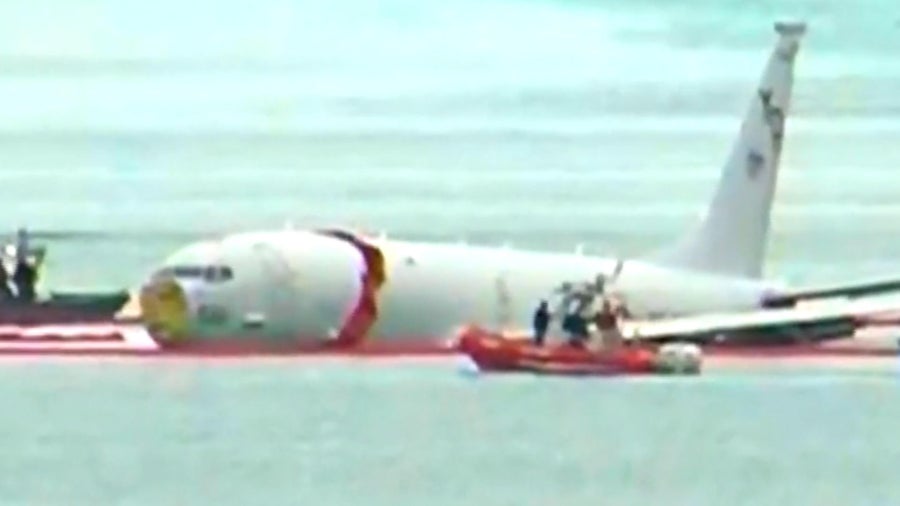 Navy spy plane with 9 on board overshoots Marine base runway in Hawaii ...