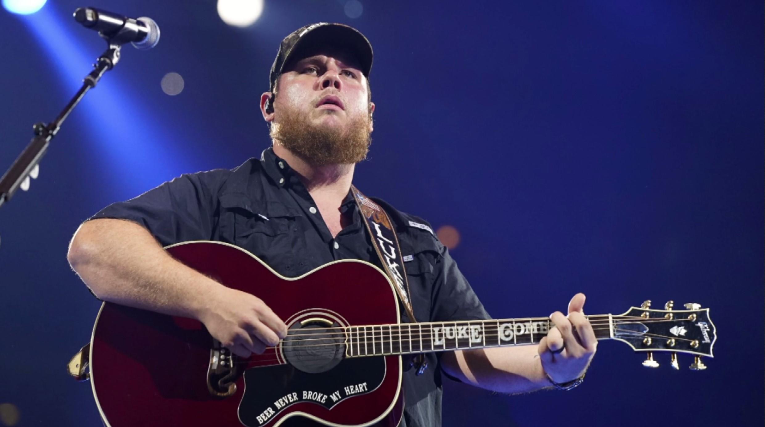 Luke Combs 'sick' over case copyright against woman who made tumblers ...