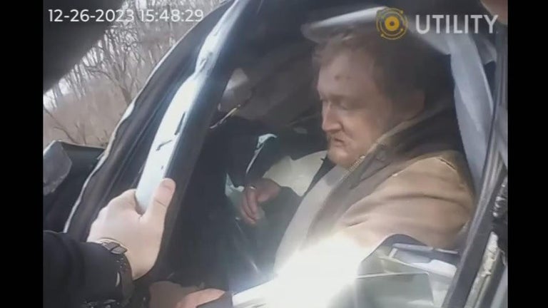 Police body cam video shows rescue of Matt Reum from wrecked truck ...