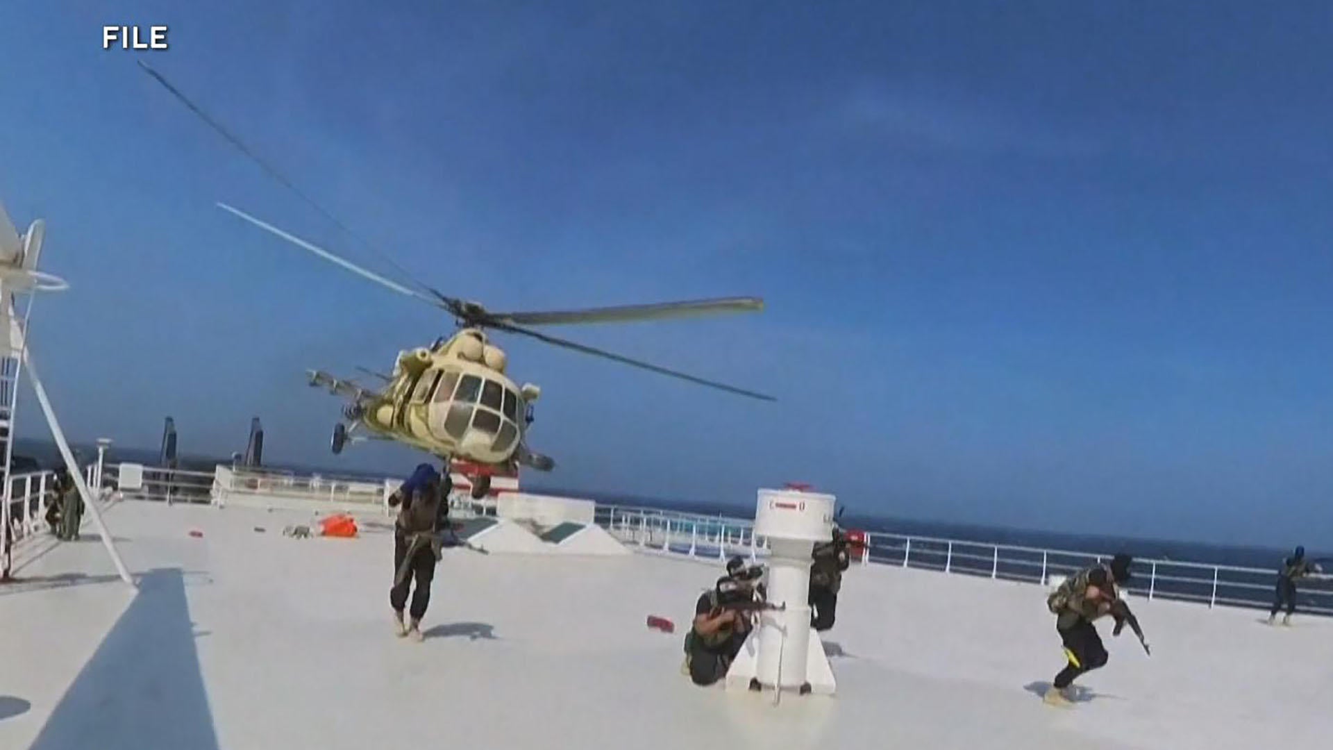 U.S. says Houthi missiles fired at cargo ship, U.S. warship in Red Sea ...