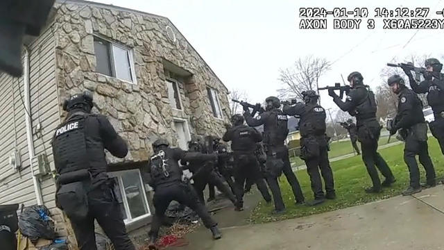 New bodycam footage from Ohio police raid shows officers using flash ...