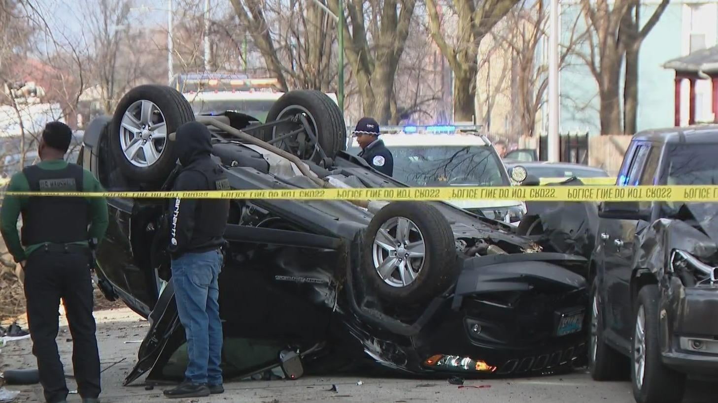 Car flips over after crash on Chicago's South Side - CBS Chicago