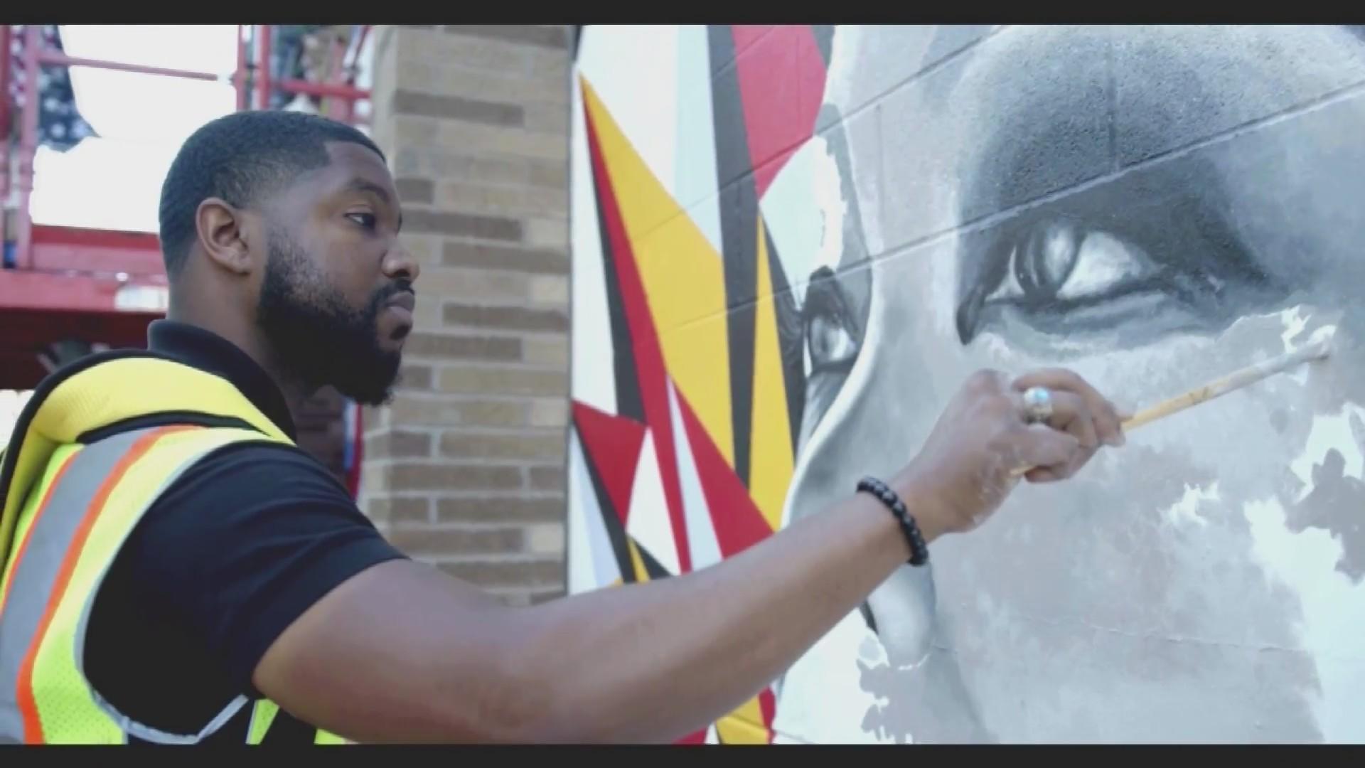 Young Chicago artist makes history with pieces around the world - CBS ...