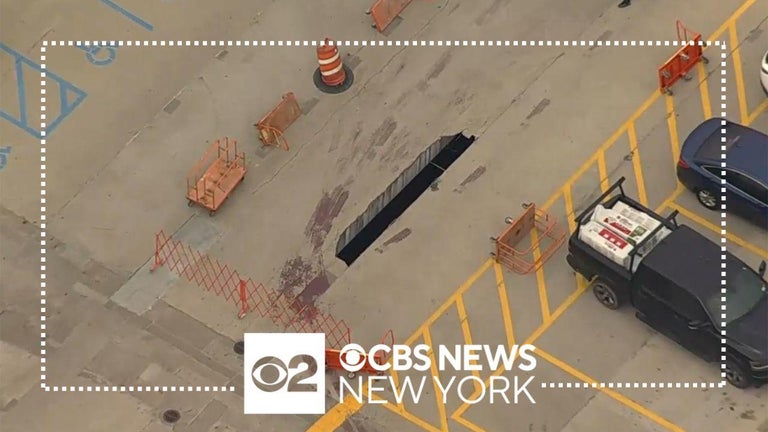 Small section of Home Depot parking lot collapses in Brooklyn - CBS New ...