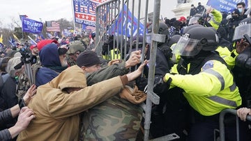 Former government employee charged with falsely accusing coworkers of ...