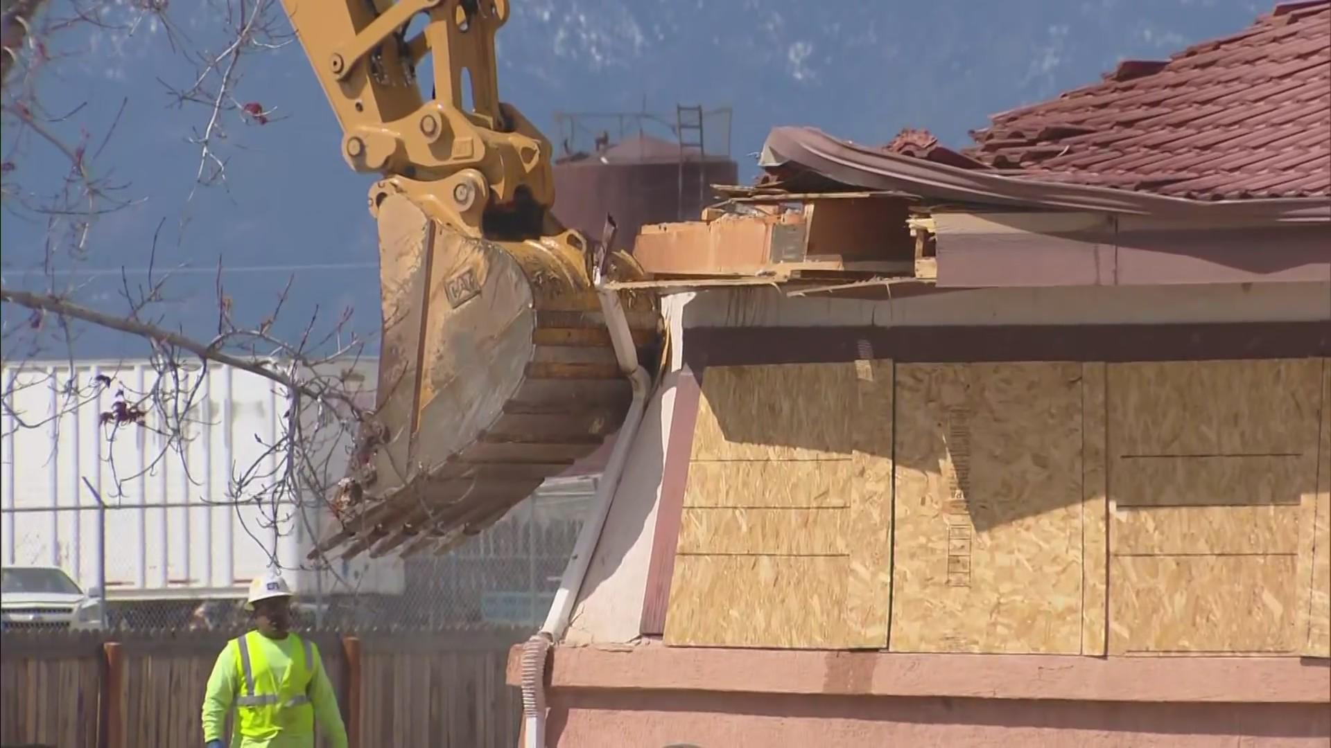 Families gather to remember loved ones before demolition of Return to ...