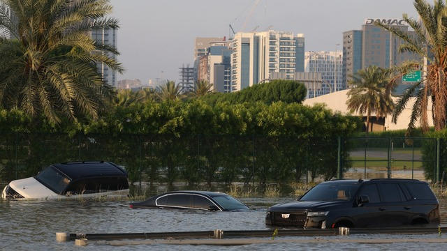 Dubai flooding hobbles major airport's operations as "historic weather ...
