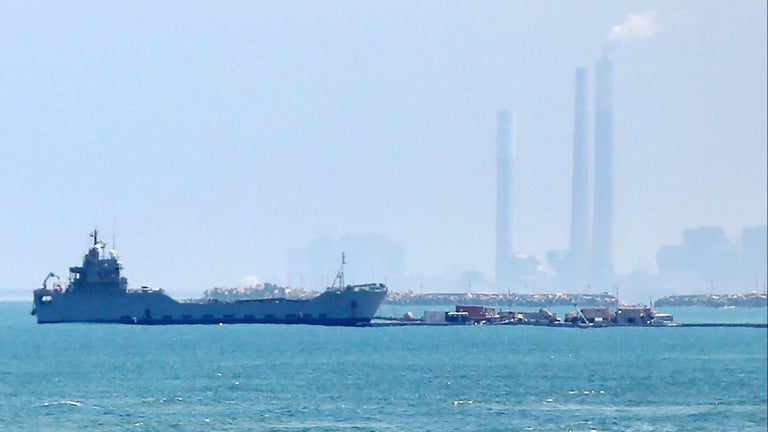 Aid starts flowing into Gaza Strip across temporary floating pier U.S ...