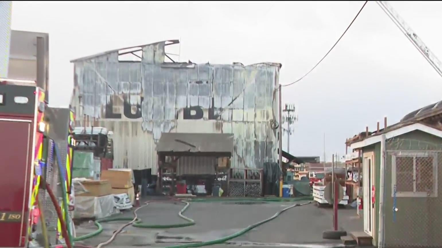Fire that destroyed warehouse at Oakland lumber yard contained; cause ...