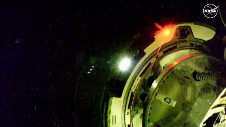 Boeing's Starliner successfully docks with space station after ...