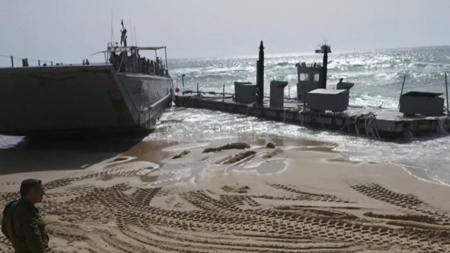 Floating Gaza aid pier temporarily dismantled due to rough seas - CBS News