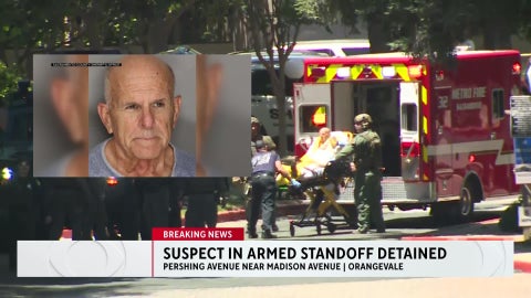 Armed suspect who didn't show up to court detained after hours-long ...