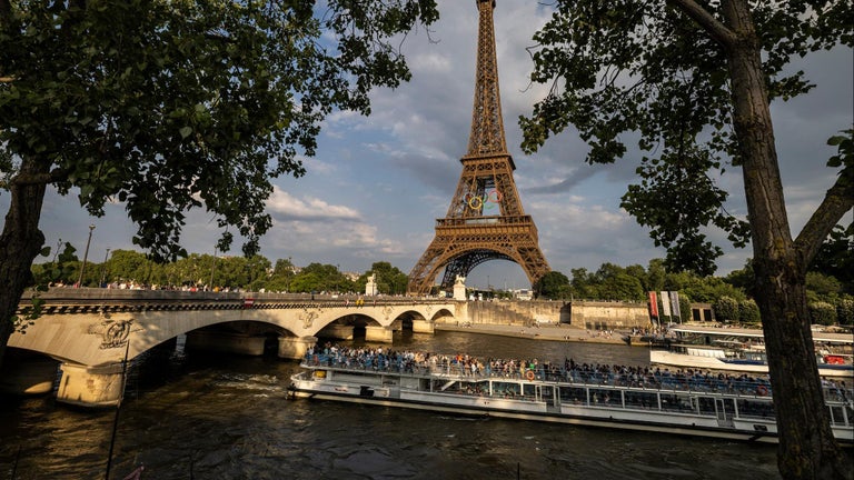 French sports minister takes a dip in the Seine weeks before the 2024 ...