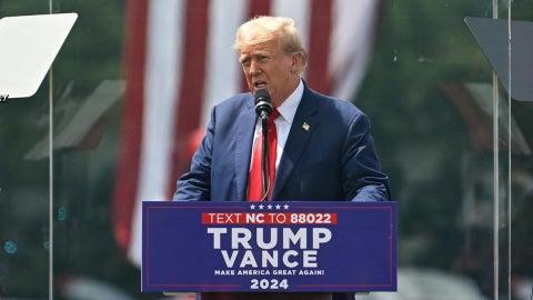 Trump returns to outdoor rallies, now surrounded by bulletproof glass ...