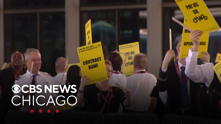Flight attendants for Chicago-based United Airlines vote to authorize ...