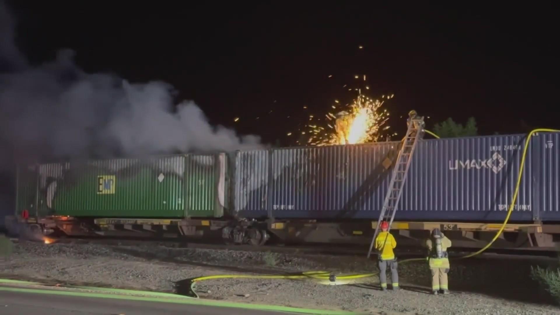 2 train cars carrying lithium-ion car batteries, other items catch fire ...