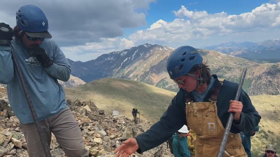 Young workers do heavy work high on Colorado's tallest mountains - CBS ...