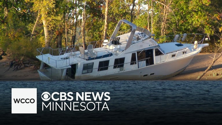 Crew moves abandoned boat from St. Croix River island after nearly a ...