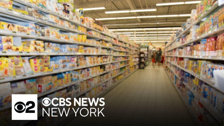 NYC ending controversial debit card program for migrants - CBS New York